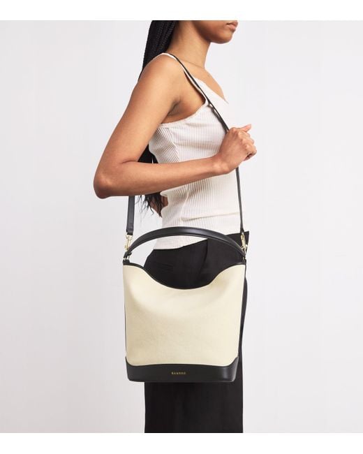 Sandro Canvas-Leather Tangoso Bucket Bag in White | Lyst