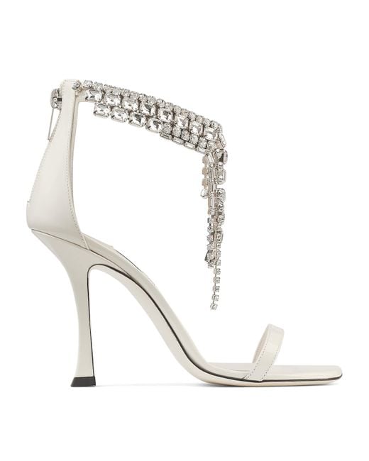 Jimmy Choo Verity 100 Patent Leather Embellished Sandals in White | Lyst UK