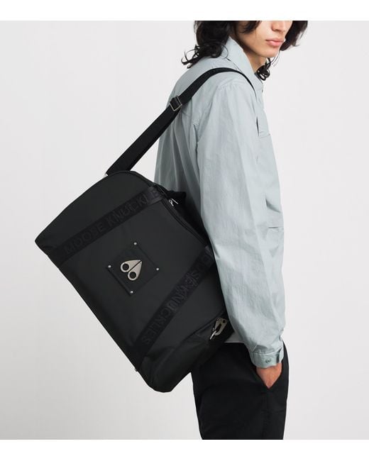 Moose Knuckles Logo Duffle Bag in Black for Men | Lyst UK