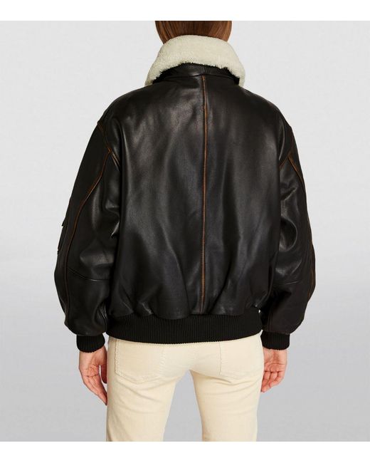 Sandro Leather Shearling Bomber Jacket in Black | Lyst UK
