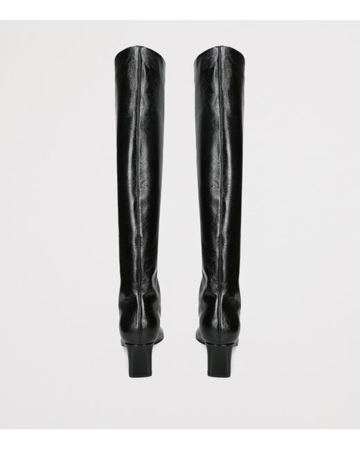 KHAITE Leather Ona Knee-High Boots 55 in Black | Lyst UK