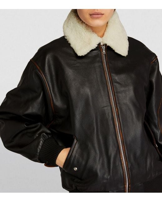 Sandro Leather Shearling Bomber Jacket in Black | Lyst UK