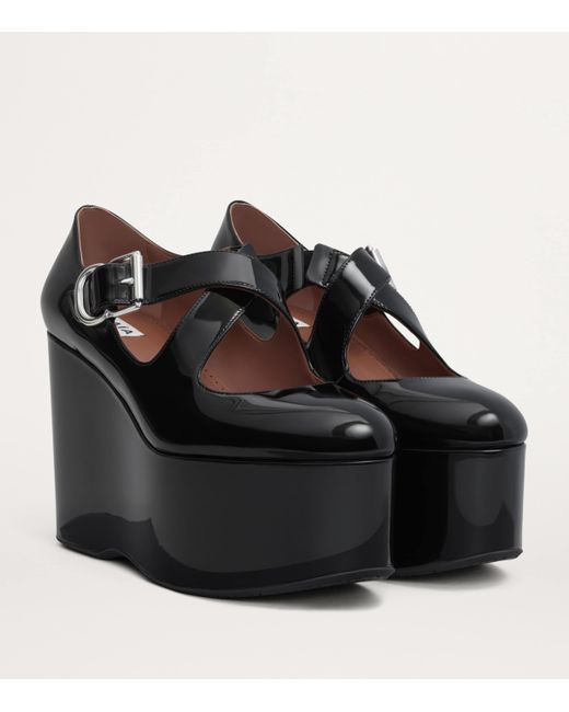 Alaïa Leather Criss-Cross Wedges 110 in Black | Lyst