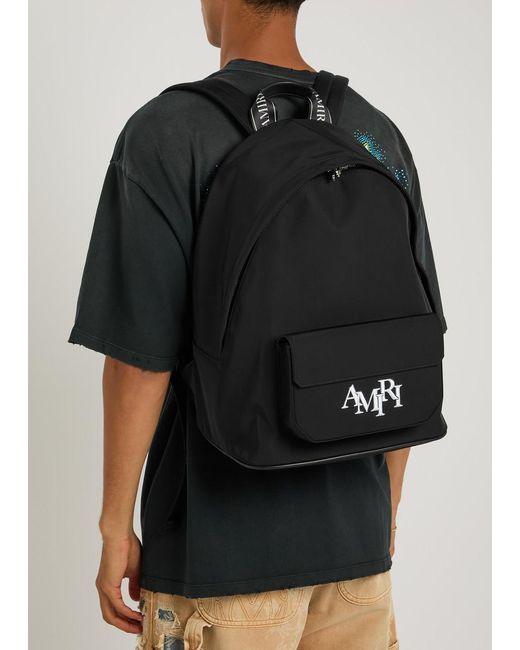 Amiri Staggered Logo Nylon Backpack in Black for Men | Lyst