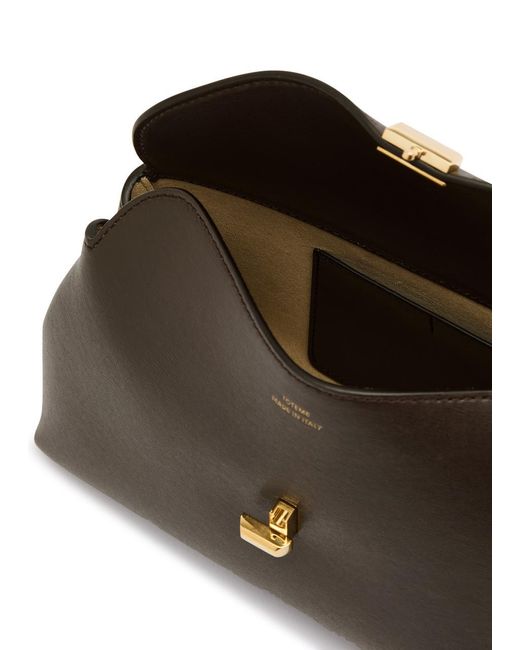 TOTEME T-Lock Leather Top-Handle Clutch in Brown | Lyst