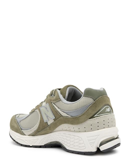New Balance 2002R Panelled Mesh Sneakers in Green | Lyst UK