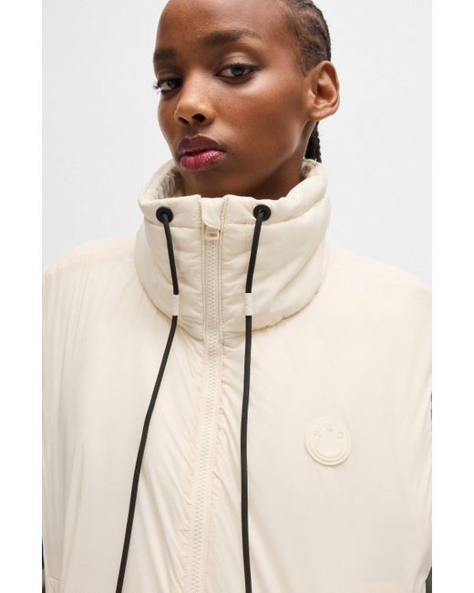 HUGO Water-repellent Gilet With Smiley-face Logo Badge in Natural | Lyst