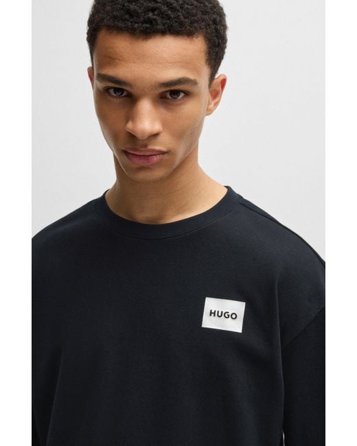 HUGO Relaxed-fit Sweatshirt With Metallic Logo Label in Blue for Men | Lyst