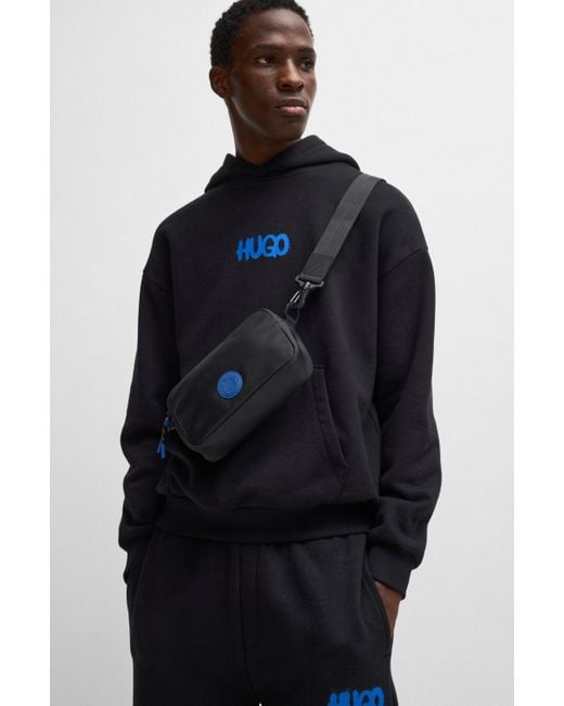 HUGO Crossbody Bag With Smiley-face Logo Patch in Blue | Lyst