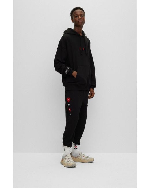 HUGO Oversized-fit Hoodie With Playing-card Artwork in Black for Men ...