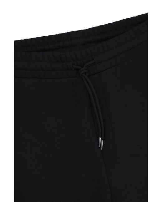 HUGO Cotton-terry Tracksuit Bottoms With Smiley-face Logo in Black for ...
