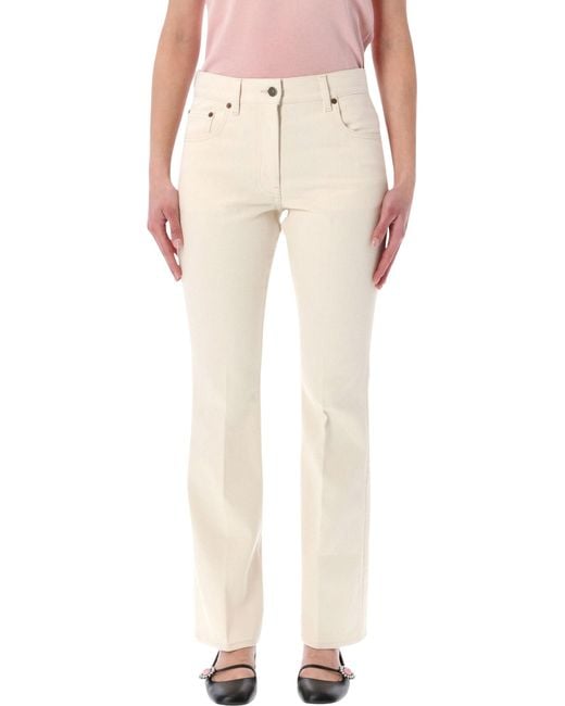 Valentino Garavani Flared Denim Jeans in Natural | Lyst UK