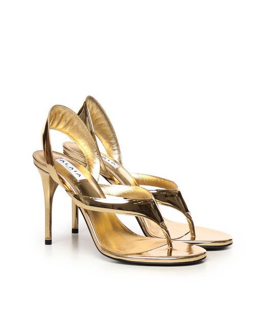 Alaïa Infradito Heeled Sandals in Metallic | Lyst
