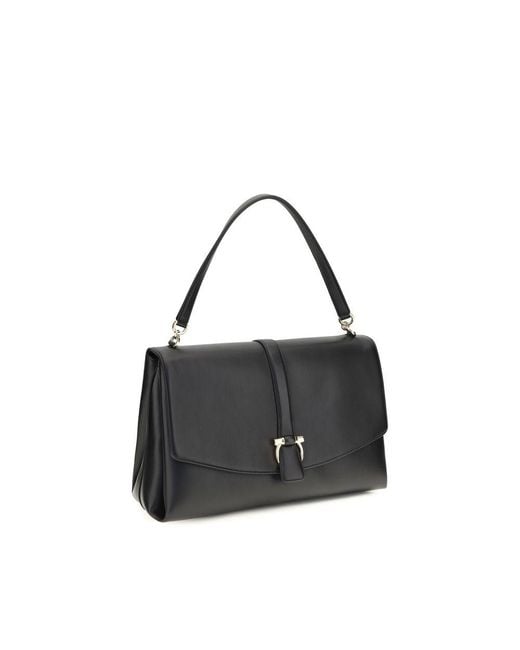 Ferragamo Calf Leather Bos Taurus Shoulder Bag in Black | Lyst UK