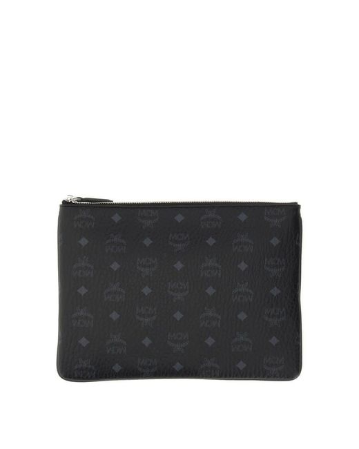 MCM Clutch in Black | Lyst