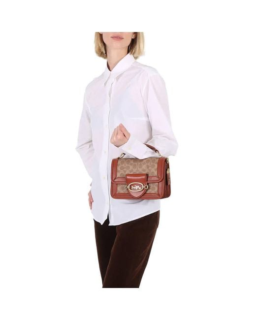 COACH Tan Rust Signature Canvas Hero Shoulder Bag in Pink | Lyst UK