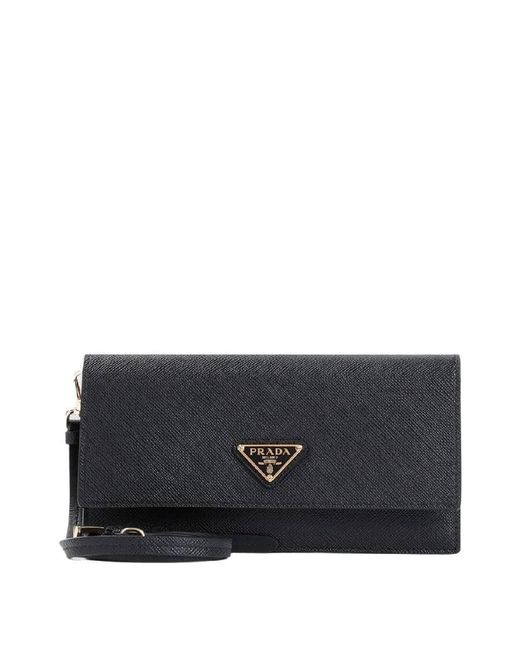 Prada Signature Logo Emblem Leather Mini Bag in Black | Lyst UK