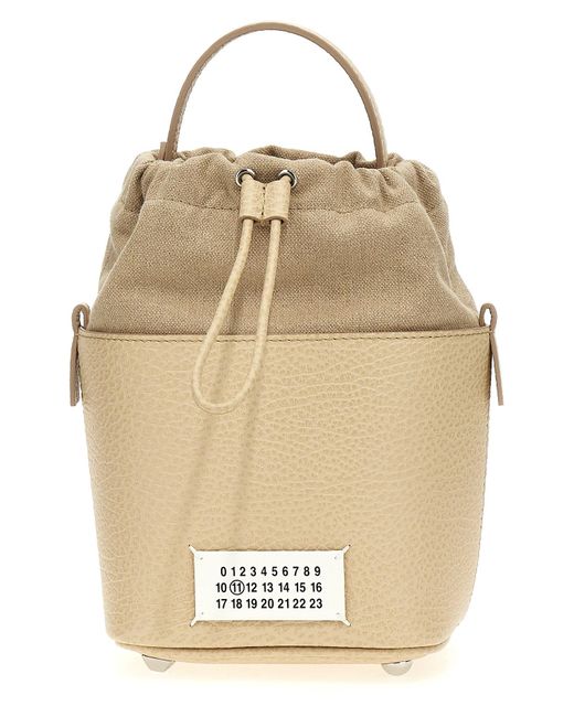 Maison bucket bag store
