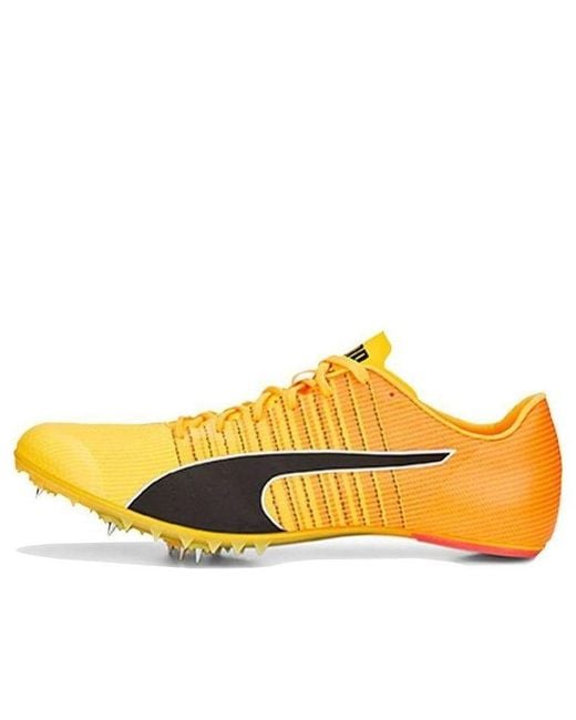 PUMA Evospeed Tokyo Future Jump 4 Track And Field Shoes in Yellow | Lyst