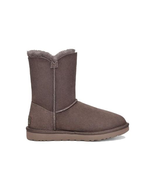 Brown Uggs With 2 Buttons