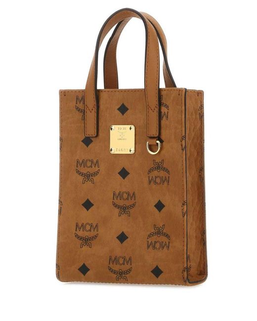 MCM Clutch in Brown | Lyst