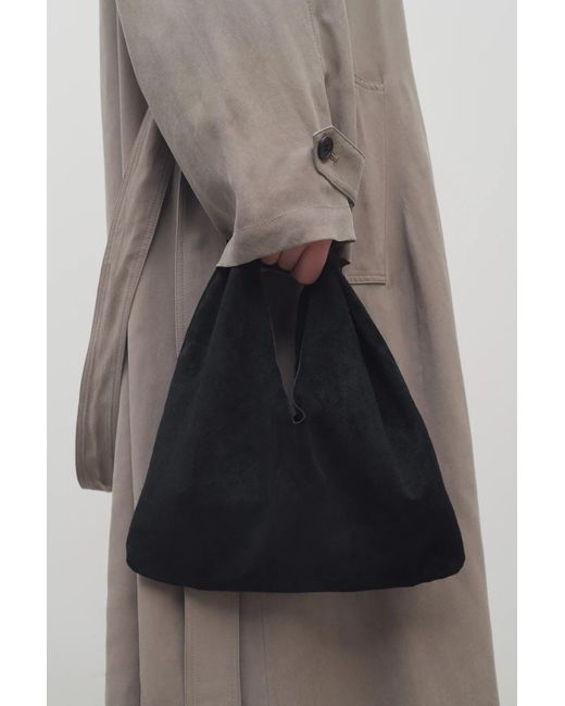 The Row Small Suede Bindle in Black | Lyst