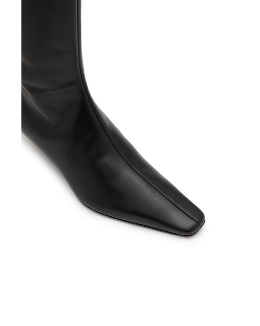 The Row Shrimpton Leather Boots in Black | Lyst