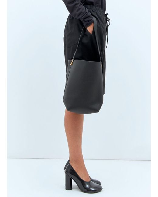 The Row Medium N/S Hook Tote Bag in Black | Lyst