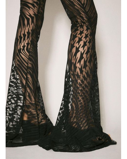 Mugler Star Flocked Mesh Flare Pants in Black | Lyst
