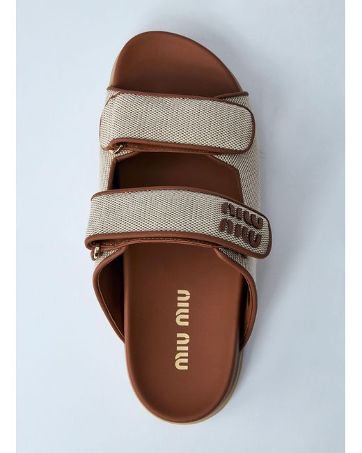 Miu Miu Logo Motif Slides in White | Lyst Canada