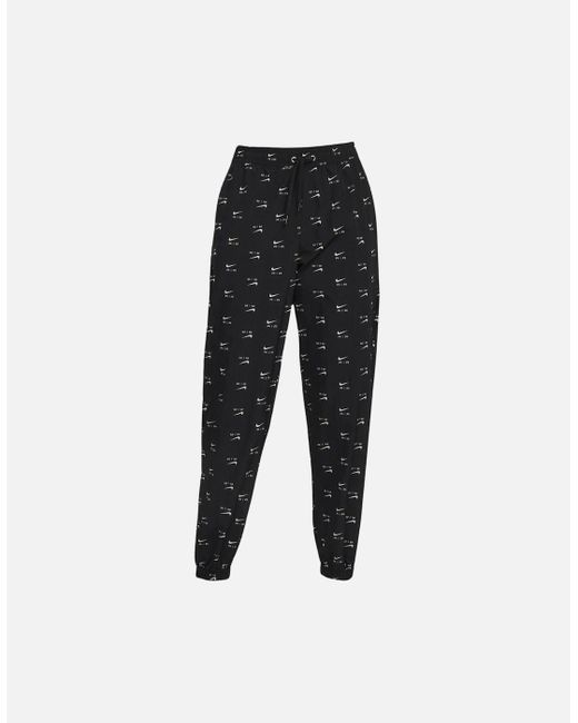 Nike All-Over Logo Track Pants in Black for Men | Lyst UK