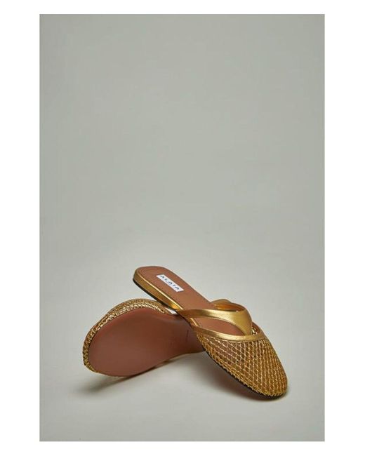Alaïa Golden Net Flat Mules in Gray | Lyst