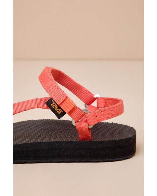 Teva Original Universal Tigerlily Slim Sandals in Orange | Lyst