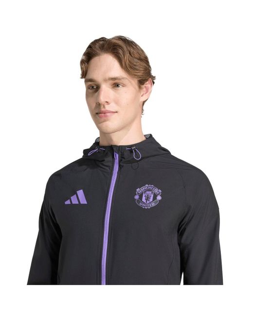 adidas Manchester United 2025/26 Tiro Vis Tech Travel Jacket in Blue ...