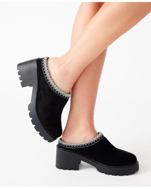 Anne Klein Daylin Cozy Lug Sole Slip On Mules in Black | Lyst
