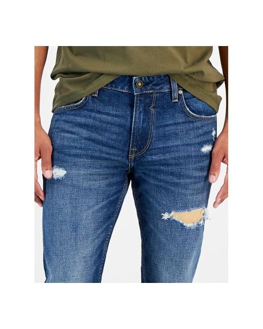 Guess Finnley Slim Fit Tapered Ripped Jeans in Blue for Men | Lyst