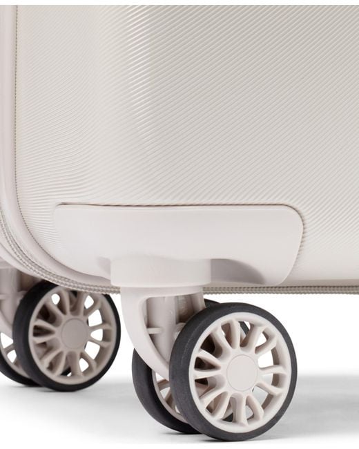 DKNY Clean Cut 21" Carry-on Spinner in Gray | Lyst