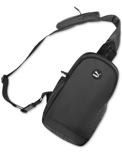 PUMA Logo Sling Backpack in Black | Lyst