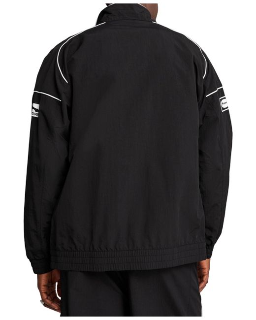PUMA Relaxed-fit Logo Graphic Track Jacket in Black for Men | Lyst