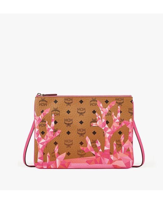 MCM Aren Crossbody Pouch In Cubic Coral Visetos in Red | Lyst