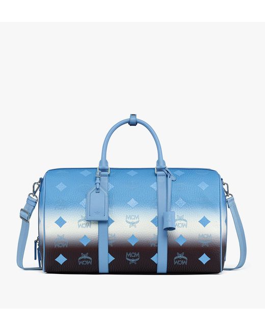 MCM Ottomar Weekender Bag In Gradation Visetos in Blue for Men | Lyst