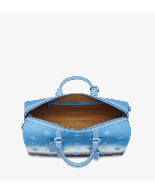 MCM Ottomar Weekender Bag In Gradation Visetos in Blue for Men | Lyst