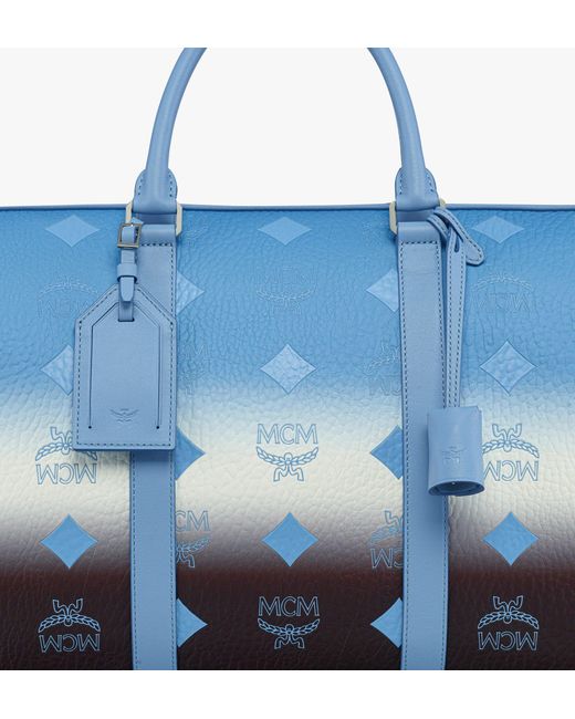 MCM Ottomar Weekender Bag In Gradation Visetos in Blue for Men | Lyst