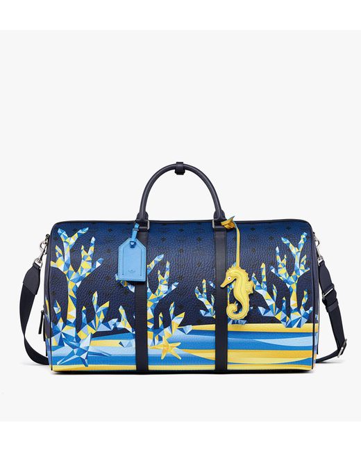MCM Ottomar Weekender Bag In Cubic Coral Visetos in Blue for Men | Lyst