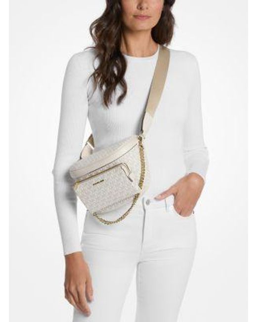 Michael Kors Slater Medium Signature Logo Sling Pack in Natural | Lyst