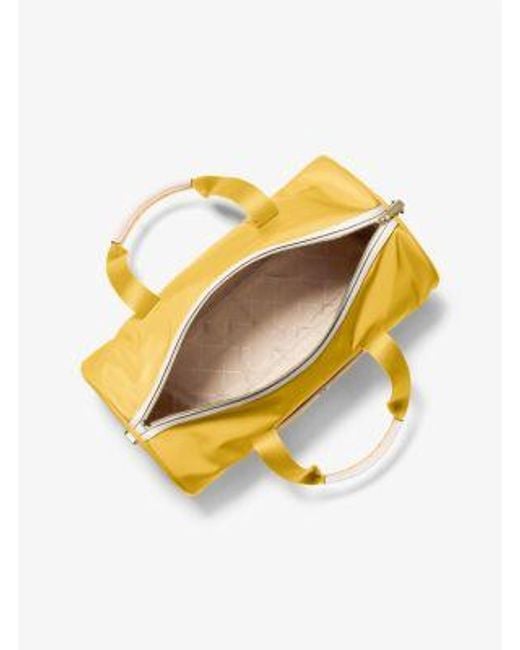 Michael Kors Jet Set Large Logo Tape Nylon Weekender Bag in Yellow | Lyst