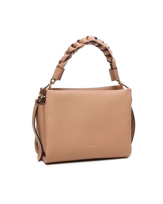 Coccinelle Handbags in Natural | Lyst