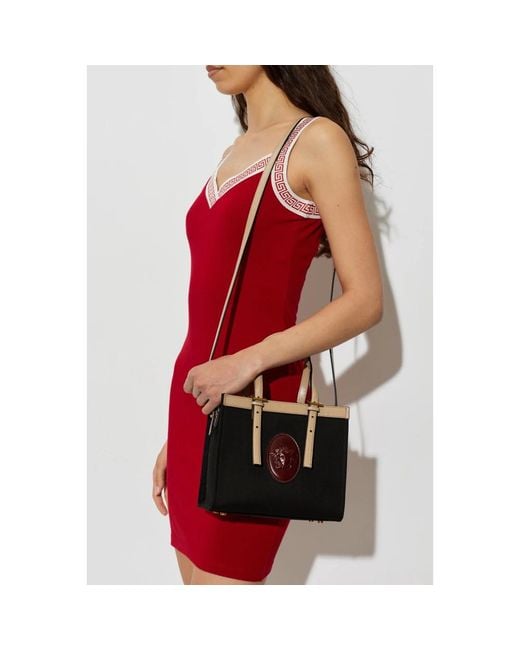 Versace Handbags in Black | Lyst
