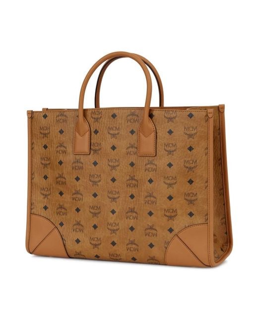 MCM Tote Bags in Brown | Lyst