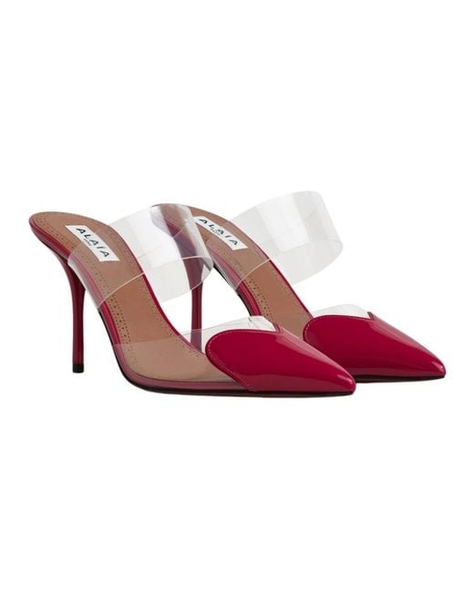 Alaïa Heeled Mules in Red | Lyst